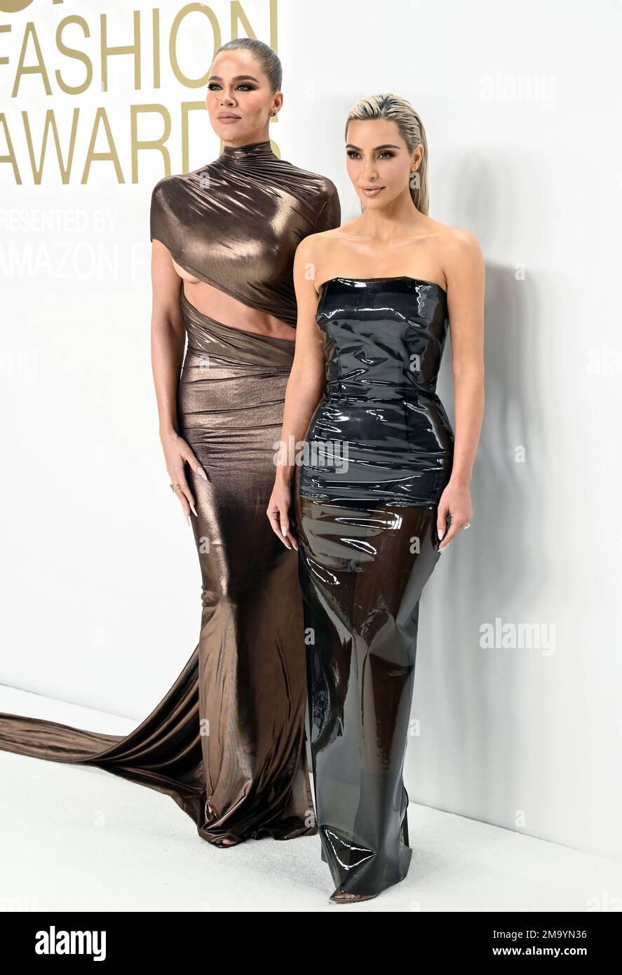 Khloe Kardashian, left, and Kim Kardashian attend the CFDA Fashion ...