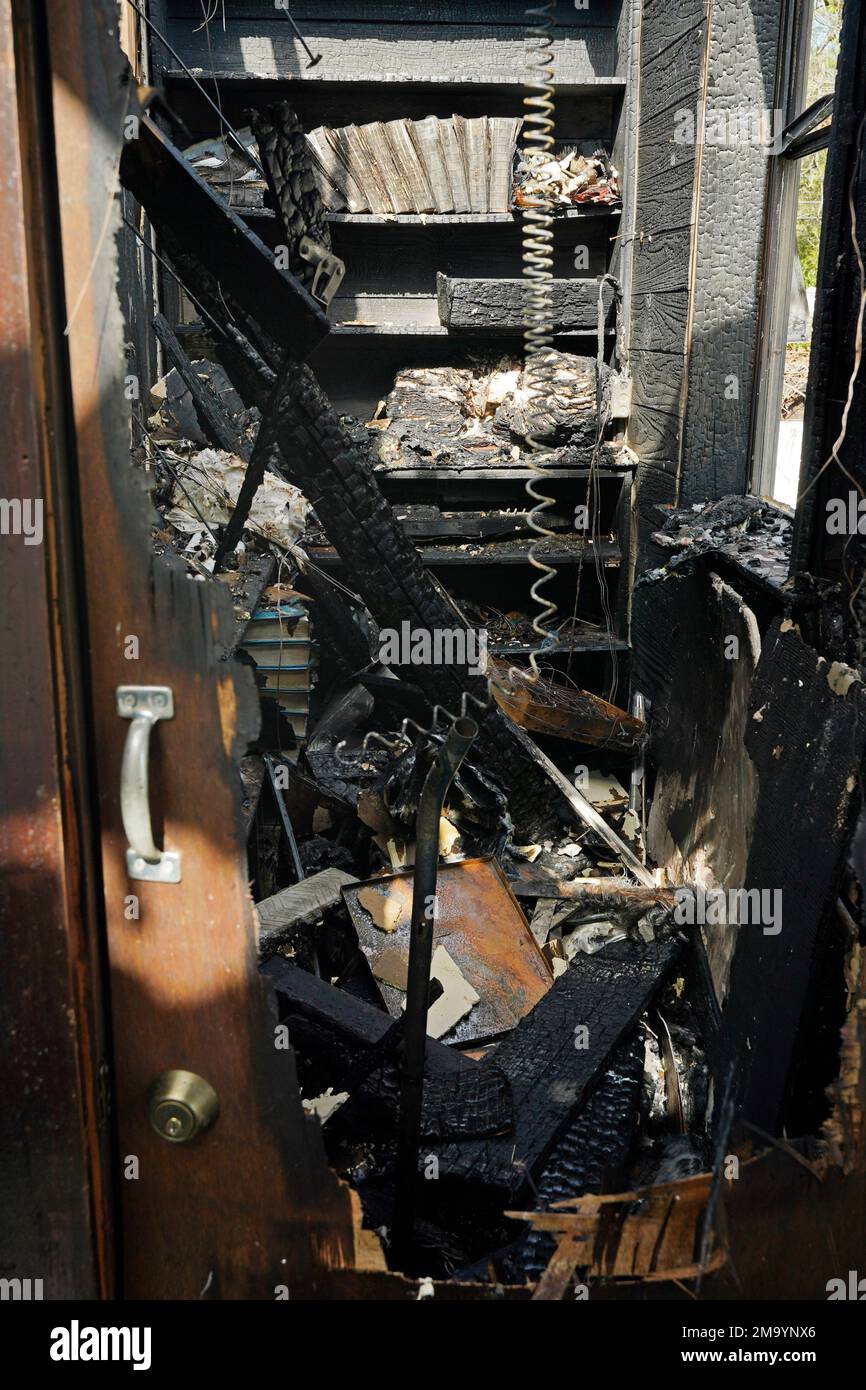 Burned insulation, charred wooden beams, melted musical instruments and ...