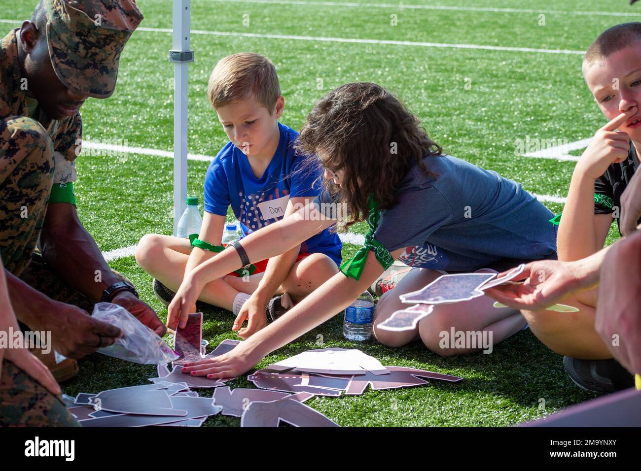 U.S. Marine Corps Pfc. Jehonathan Destine (far left), assigned to the ...