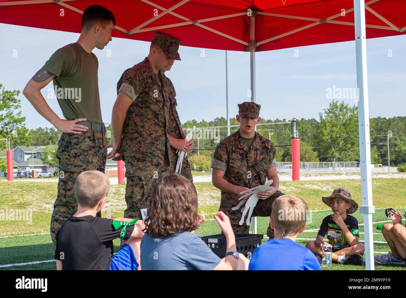 U.S. Marine volunteers teach the devil pups in training on the purpose ...