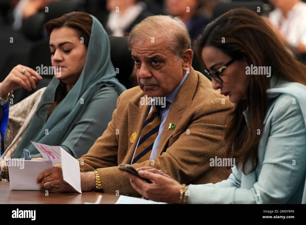 Muhammad Shehbaz Sharif, prime minister of Pakistan, listens to ...