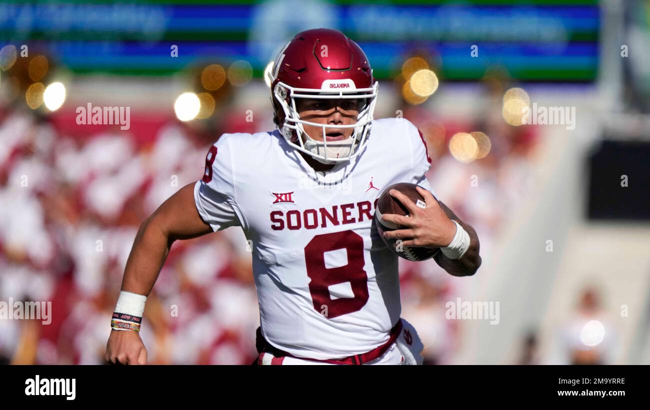 Oklahoma quarterback Dillon Gabriel (8) runs up field during an NCAA ...