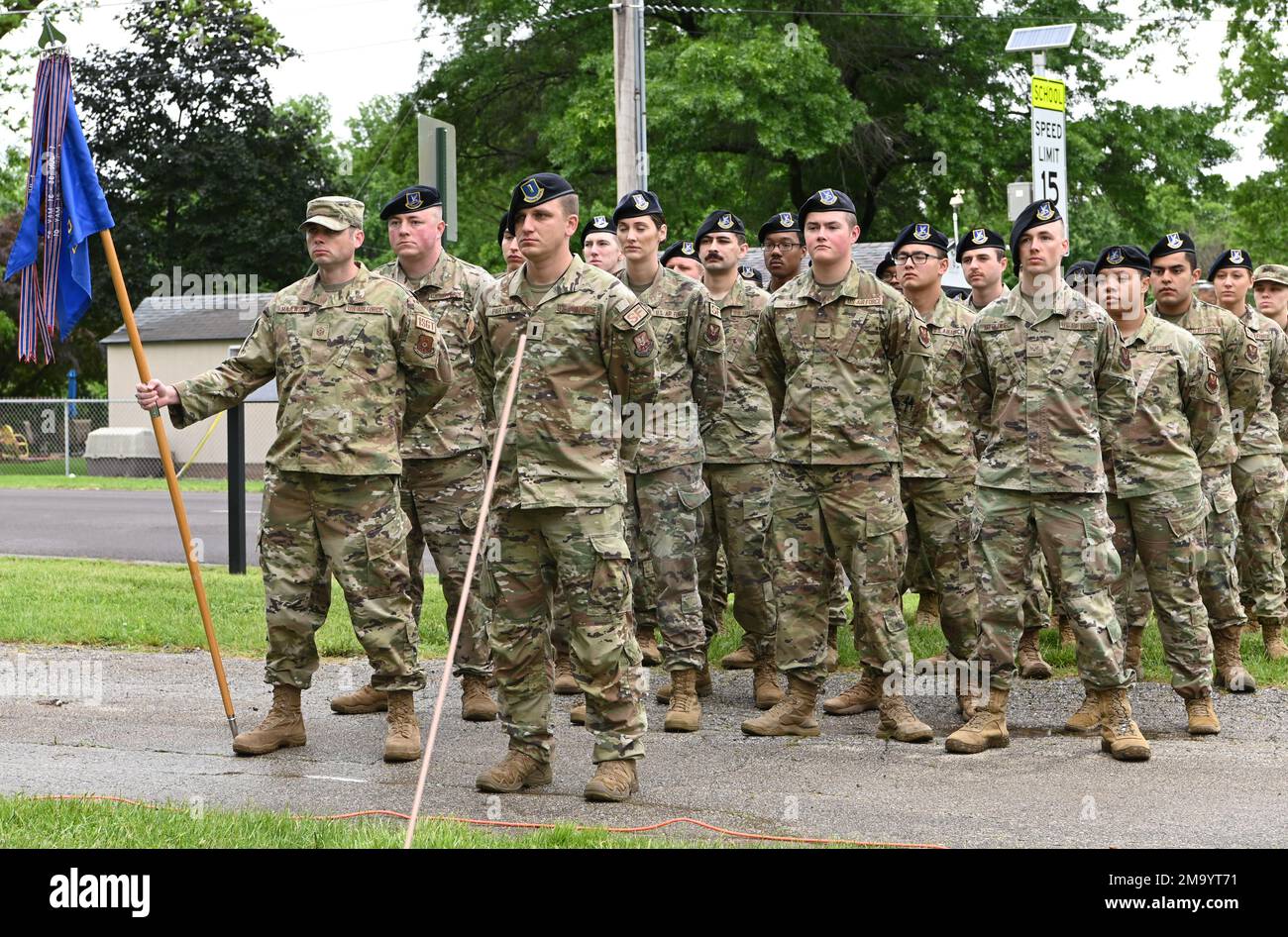 Members of the 509th Security Forces Squadron stand in formation during ...