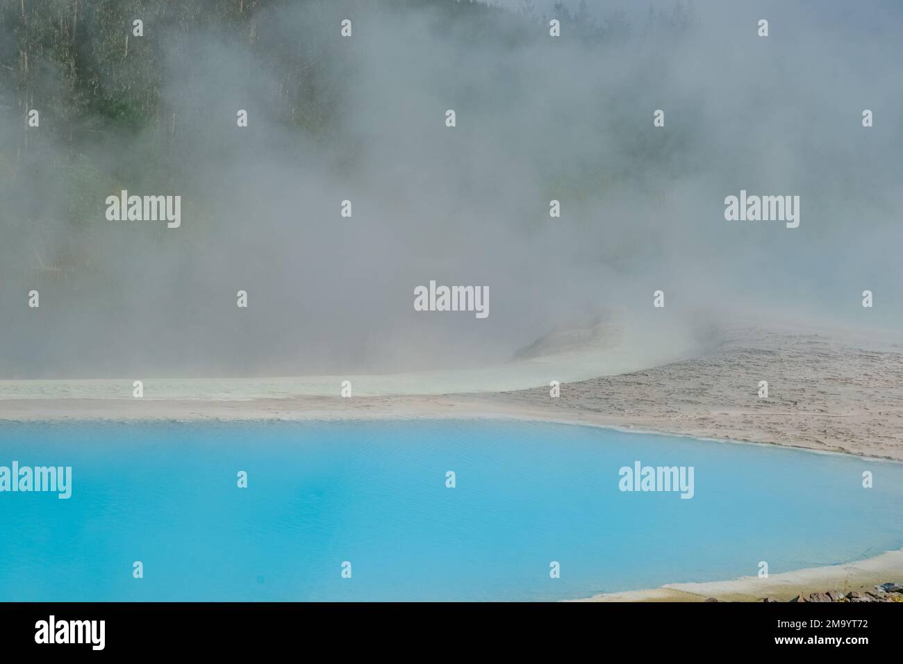 Thermal pool in public area steaming and hot turquoise water Stock ...
