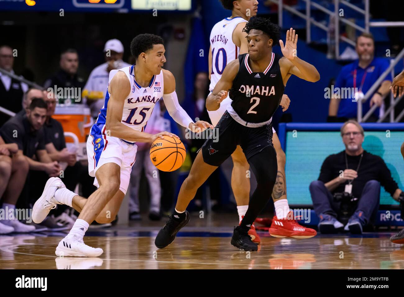 Kansas guard Kevin McCullar Jr. (15) drives against Omaha guard Jaeden ...