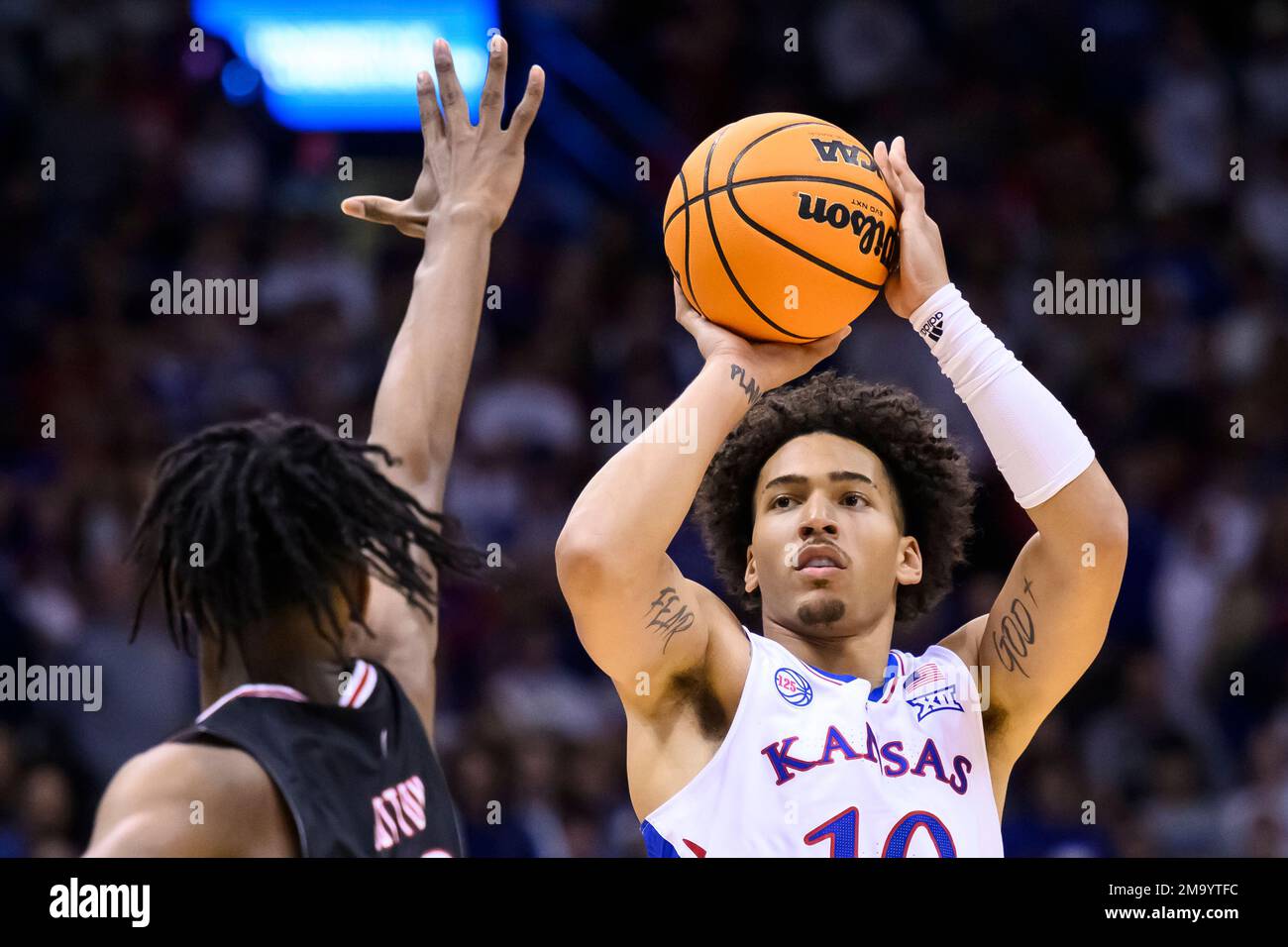 Kansas forward Jalen Wilson (10) shoots over Omaha forward Marquel ...