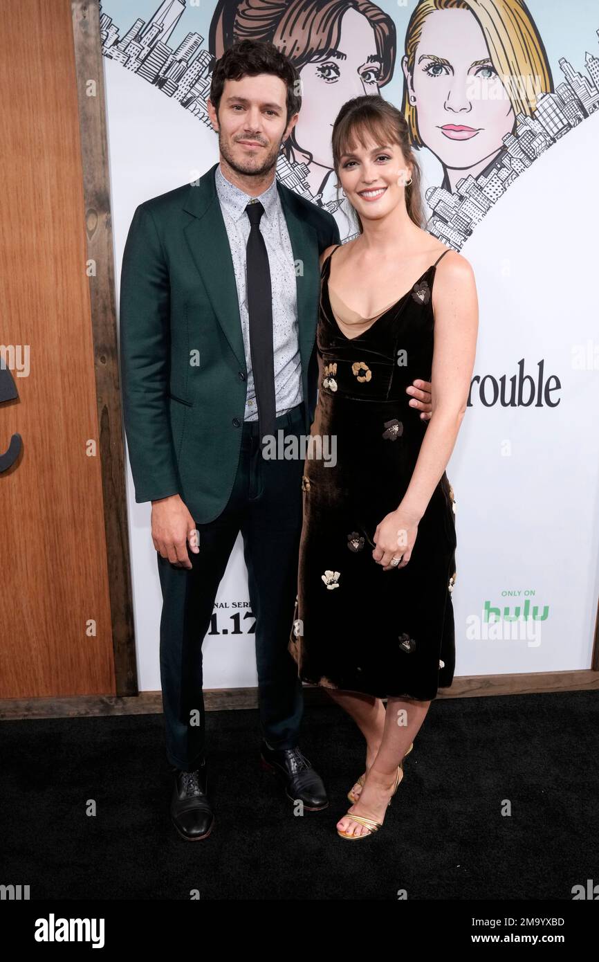 Adam Brody and Leighton Meester attend the premiere of the FX mini ...