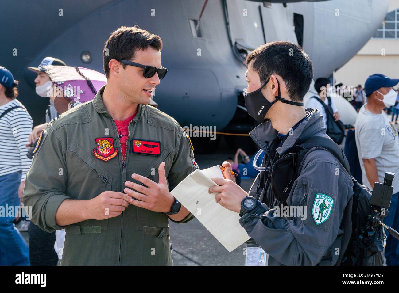 Capt. Logan Hawke, 535th Airlift Squadron pilot, interacts with guests ...