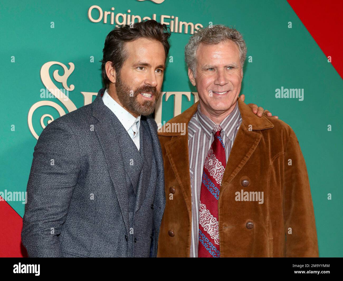 Actors Ryan Reynolds, left, and Will Ferrell, right, attend the Apple ...