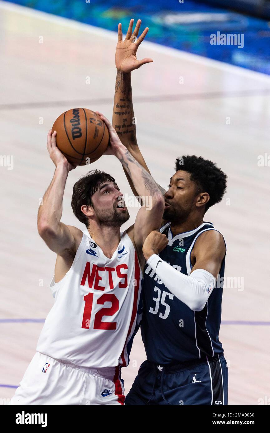 Brooklyn Nets forward Joe Harris (12) attempts a shot as Dallas ...