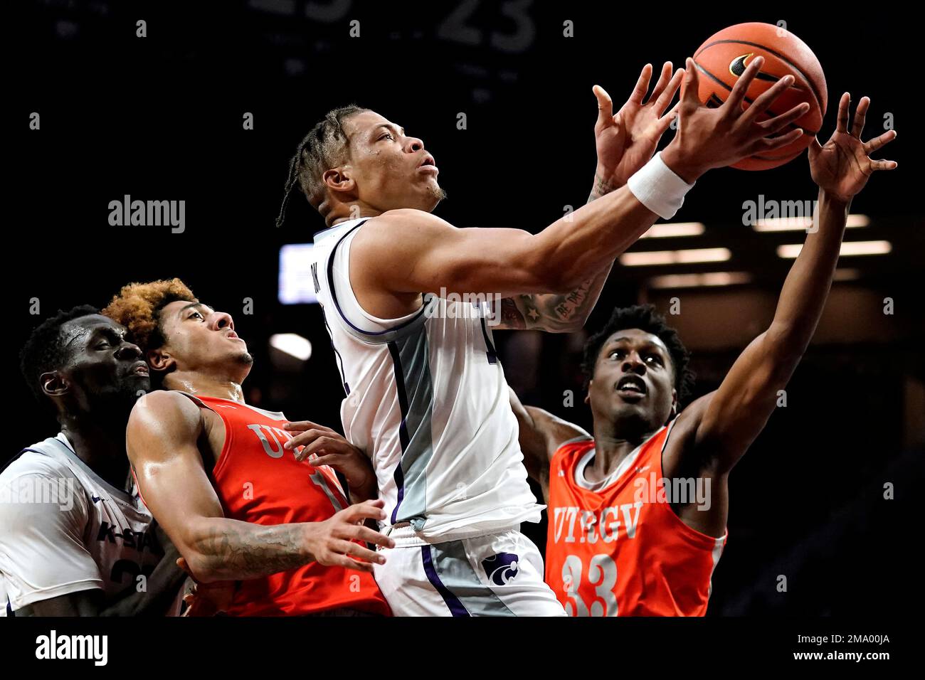 Kansas State forward Keyontae Johnson shoots under pressure from Texas ...