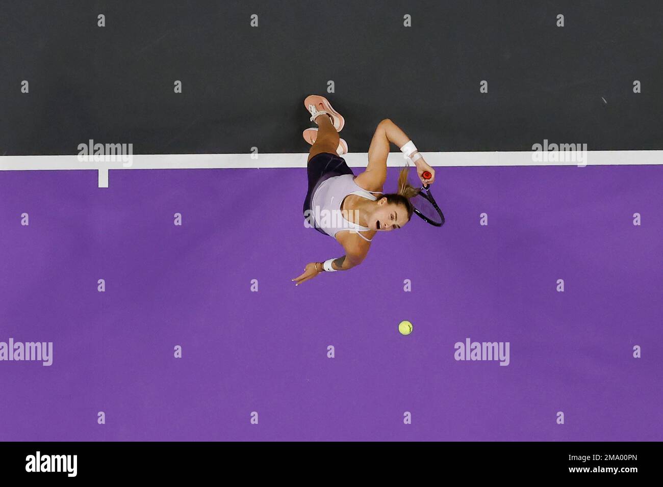 Aryna Sabalenka, of Belarus, serves to Caroline Garcia, of France, in ...