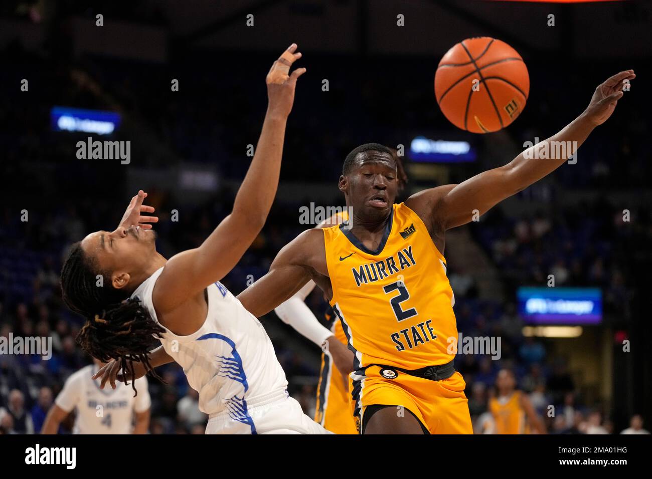 Saint Louis' Yuri Collins, left, and Murray State's Rob Perry (2) reach ...