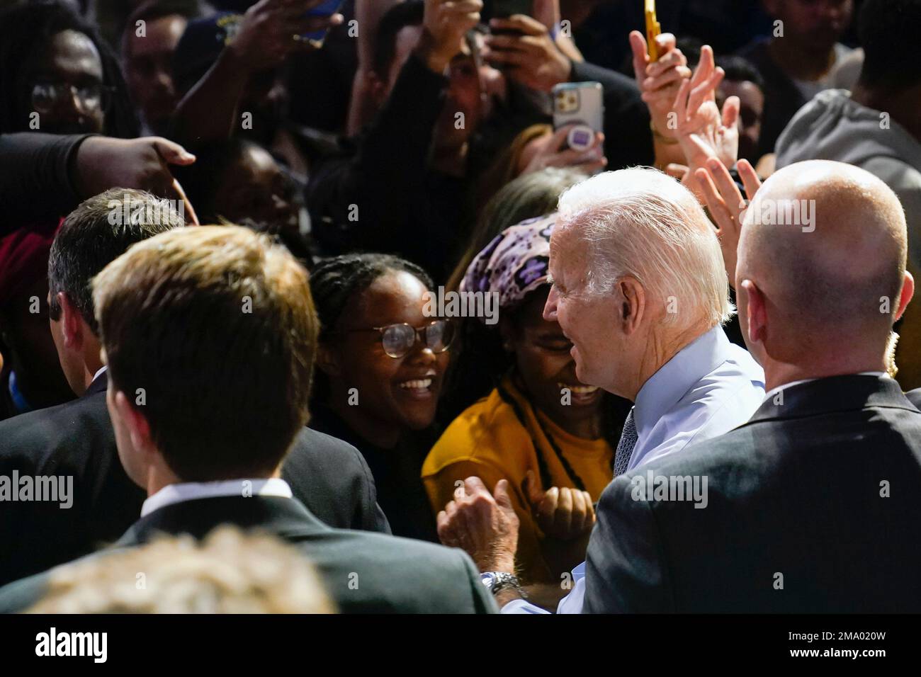 President Joe Biden greets people in the crowd after speaking at a ...