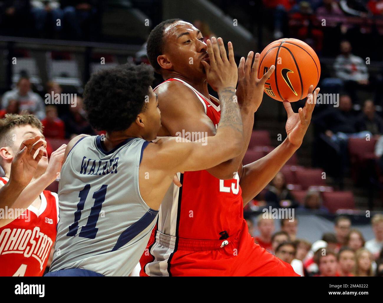 Ohio State forward Zed Key, right, grabs a rebound in front of Robert ...