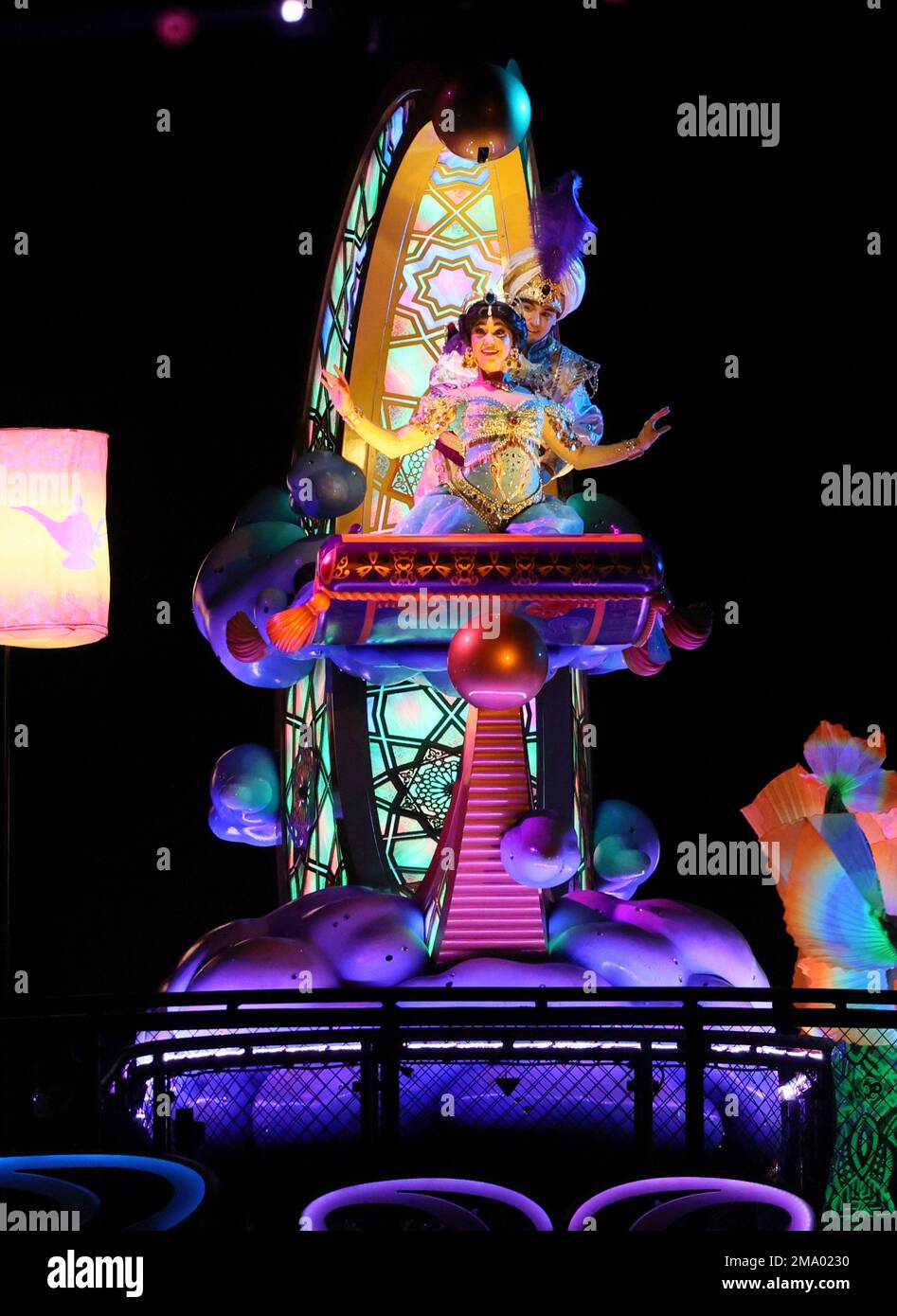 Disney characters perform on a float on the water at a press preview of ...