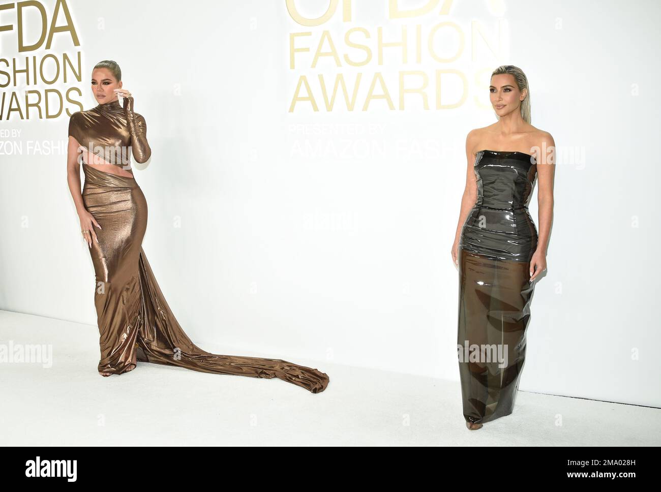 Khloe Kardashian, left, and Kim Kardashian attend the CFDA Fashion ...