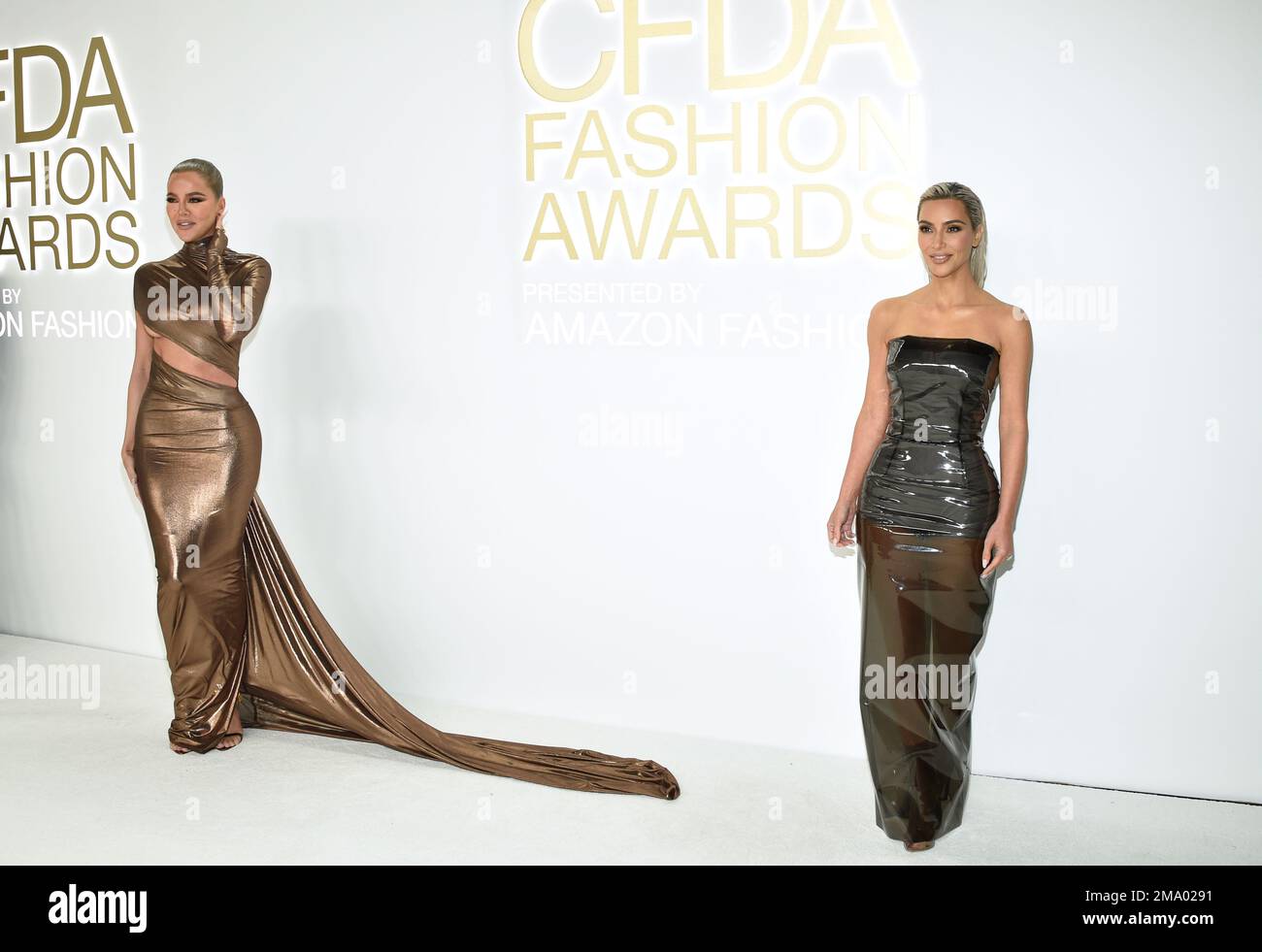 Khloe Kardashian, left, and Kim Kardashian attend the CFDA Fashion ...