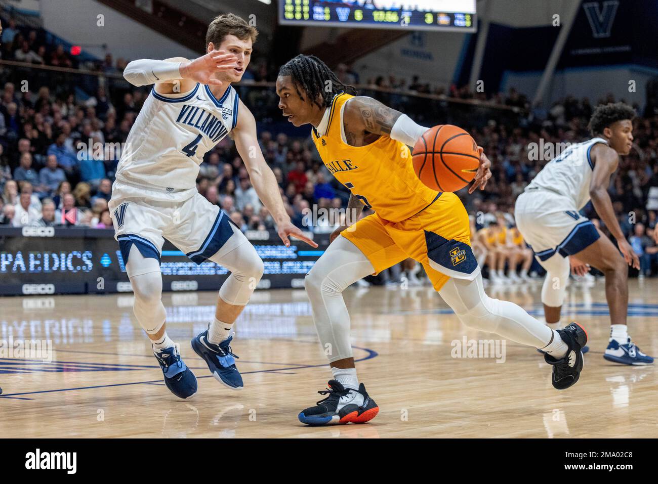 La Salle guard Khalil Brantley (5) moves around Villanova guard Chris ...