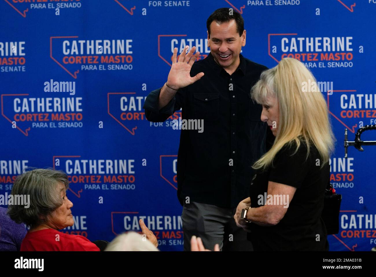 Democratic candidate for Nevada secretary of state, Cisco Aguilar, center, greets supporters at ...