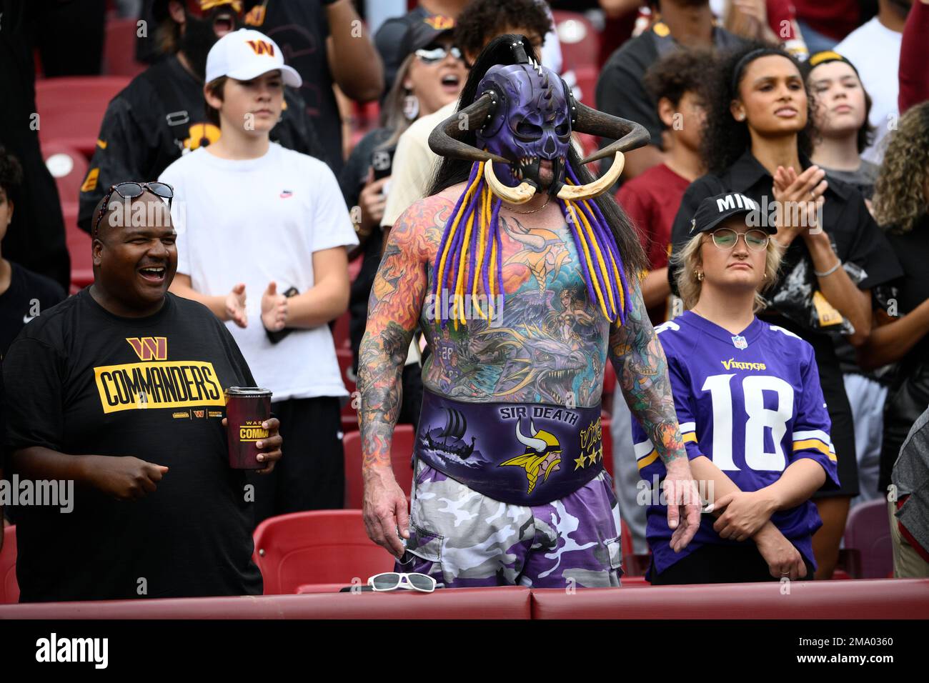 Spectators watch during the first half of an NFL football game between ...