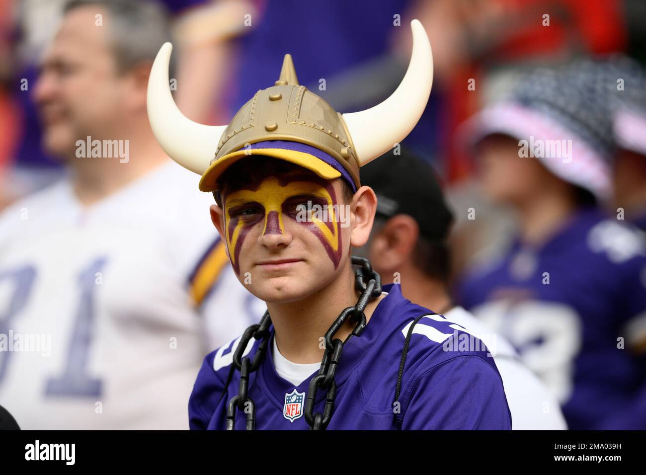 A Minnesota Vikings fan looks on before an NFL football game between ...