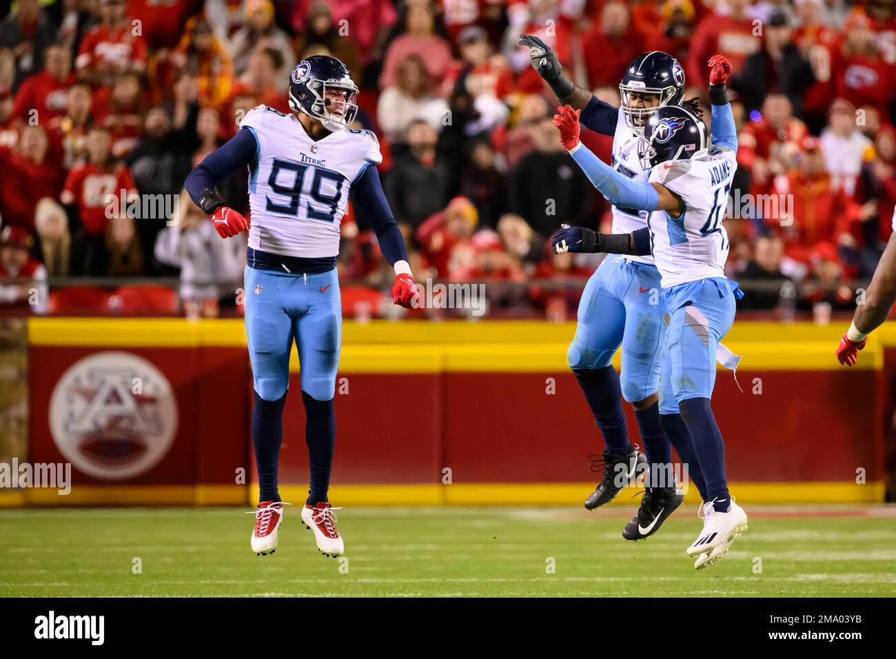 Tennessee Titans defensive end Denico Autry, center, celebrates a sack ...