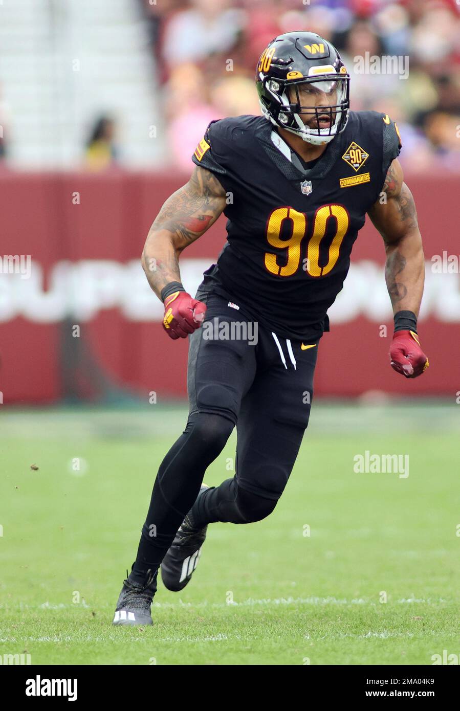 Washington Commanders defensive end Montez Sweat (90) runs during an ...