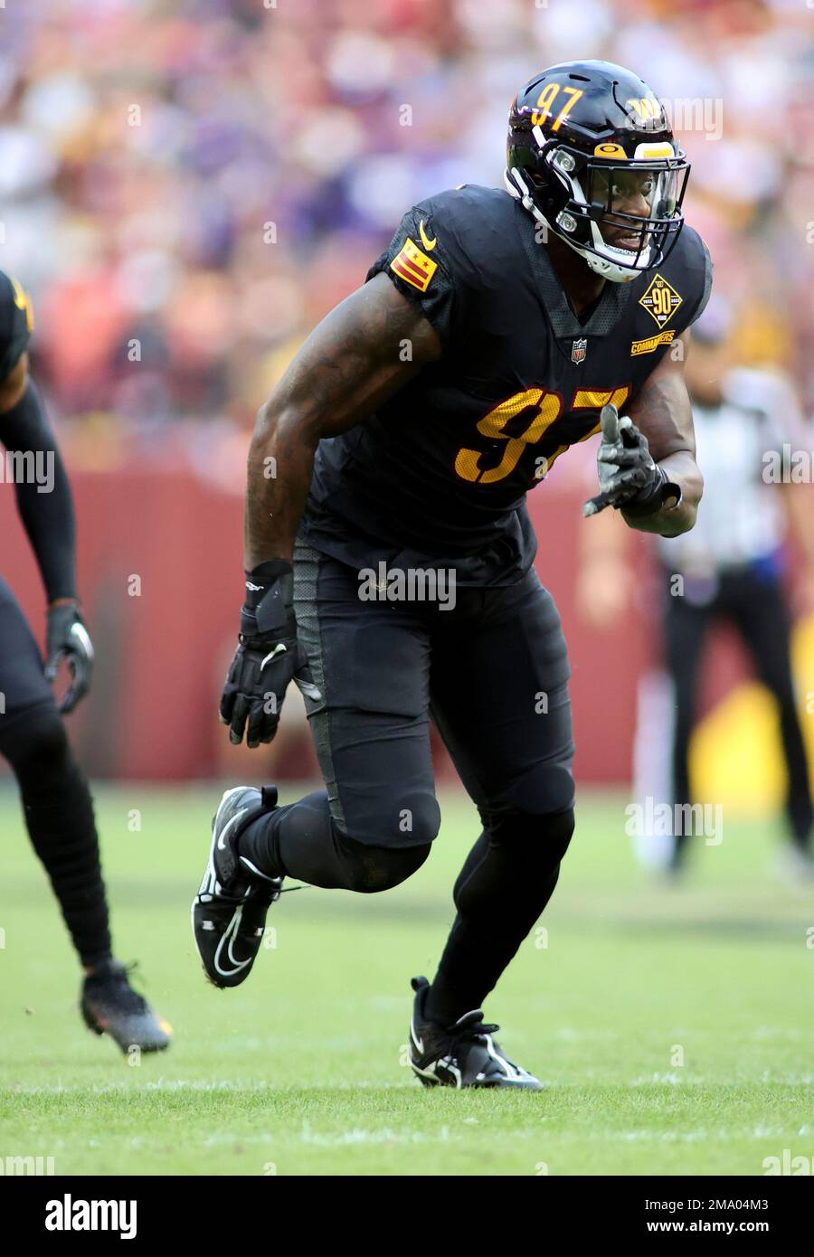 Washington Commanders defensive end Efe Obada (97) runs during an NFL ...
