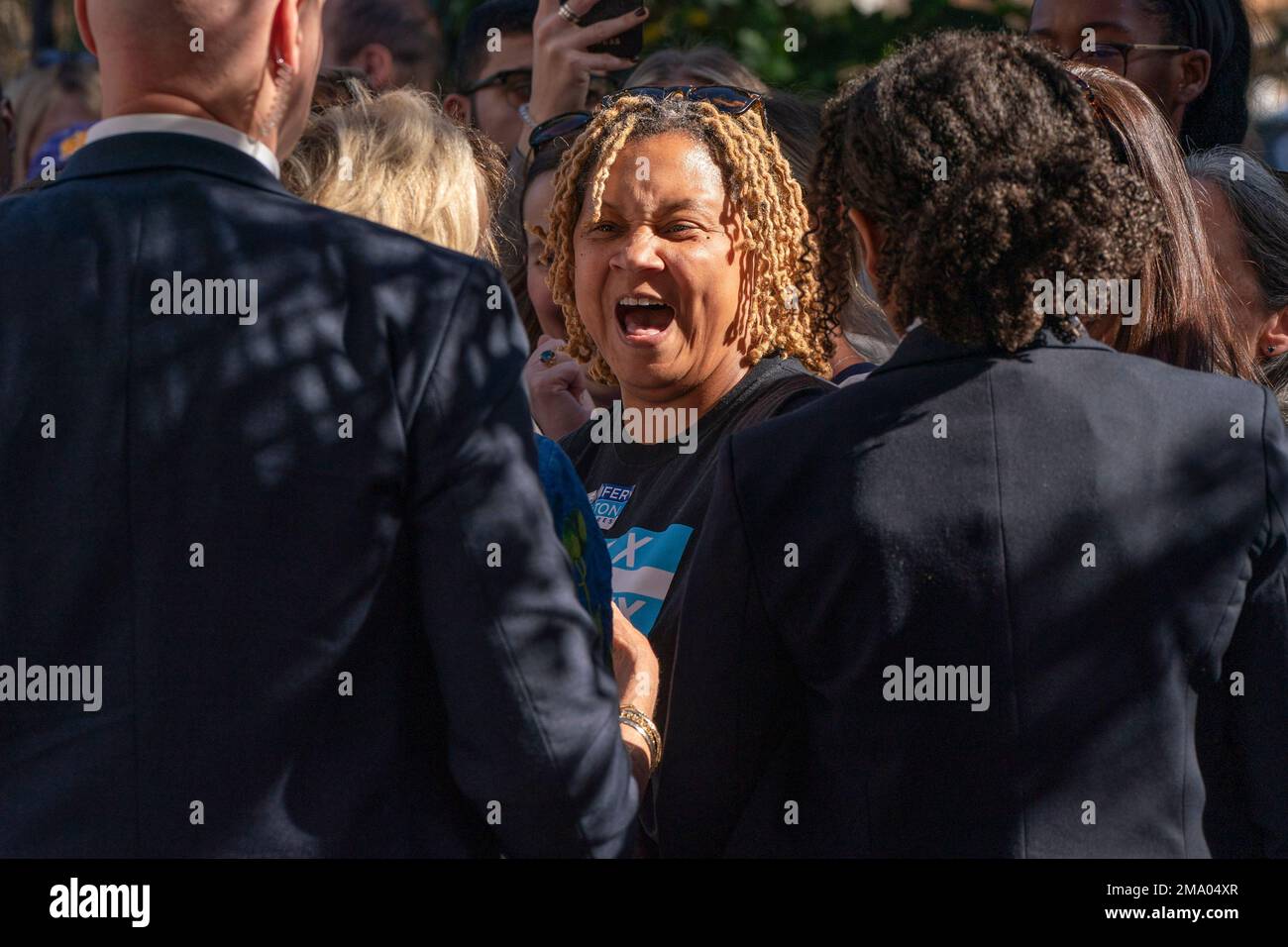 A supporter of Rep. Jennifer Wexton, D-Va., reacts on meeting first ...