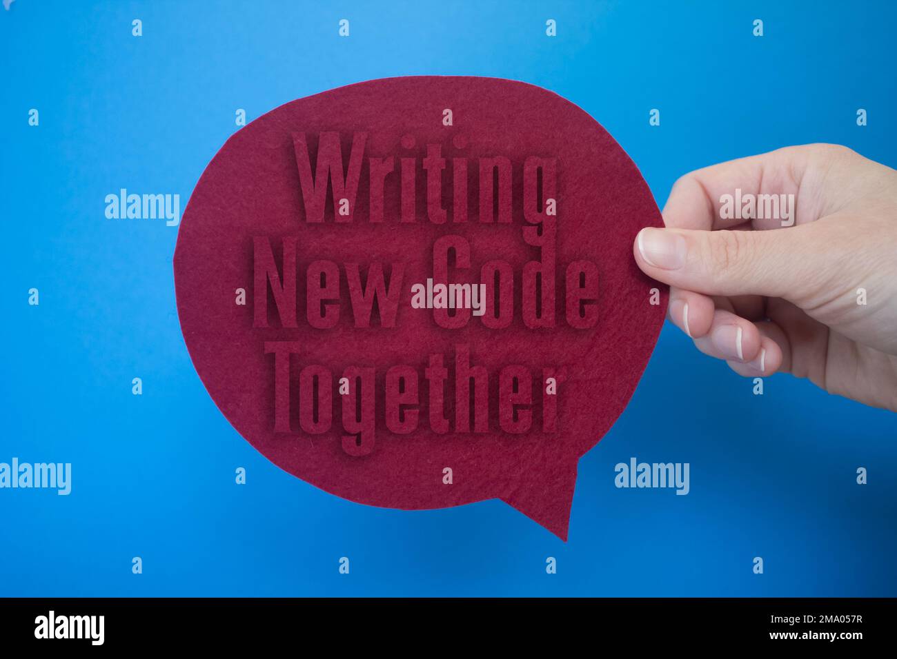 Speech bubble in front of colored background with Writing New Code ...