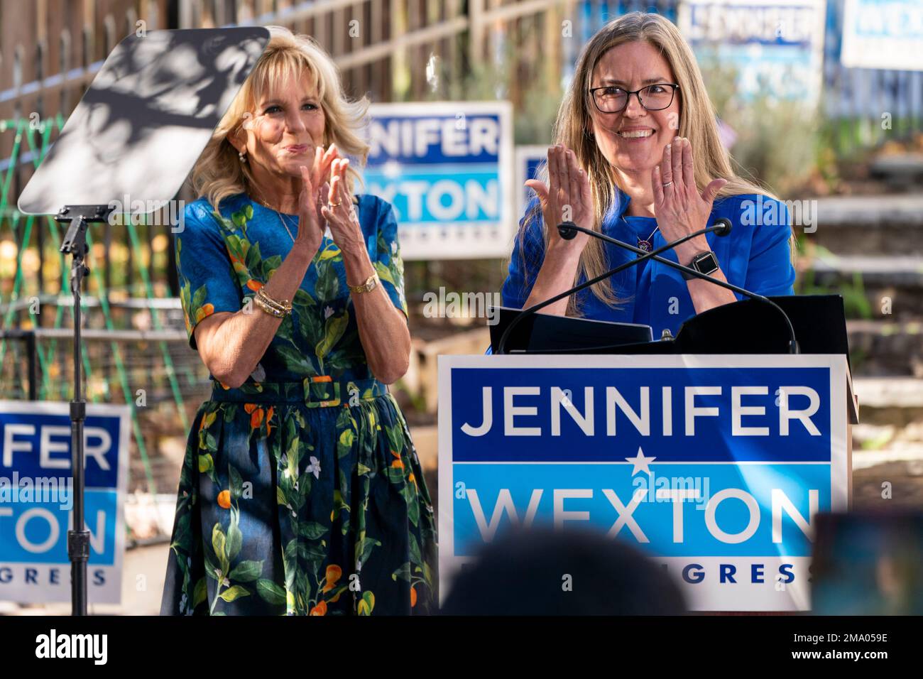 First lady Jill Biden applauds as Rep. Jennifer Wexton, D-Va., right ...