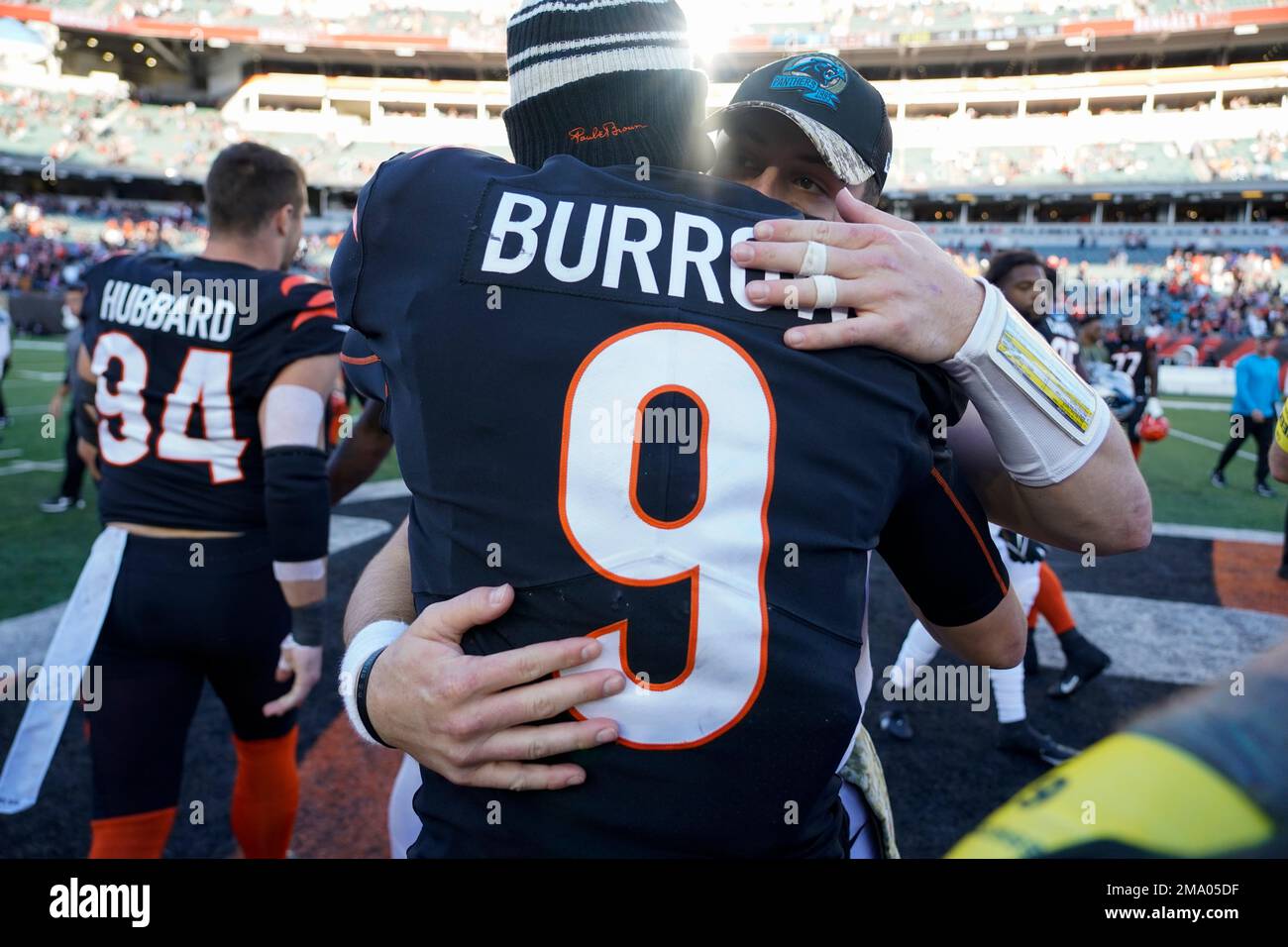 Cincinnati Bengals quarterback Joe Burrow (9) embraces Carolina Panthers quarterback Baker ...