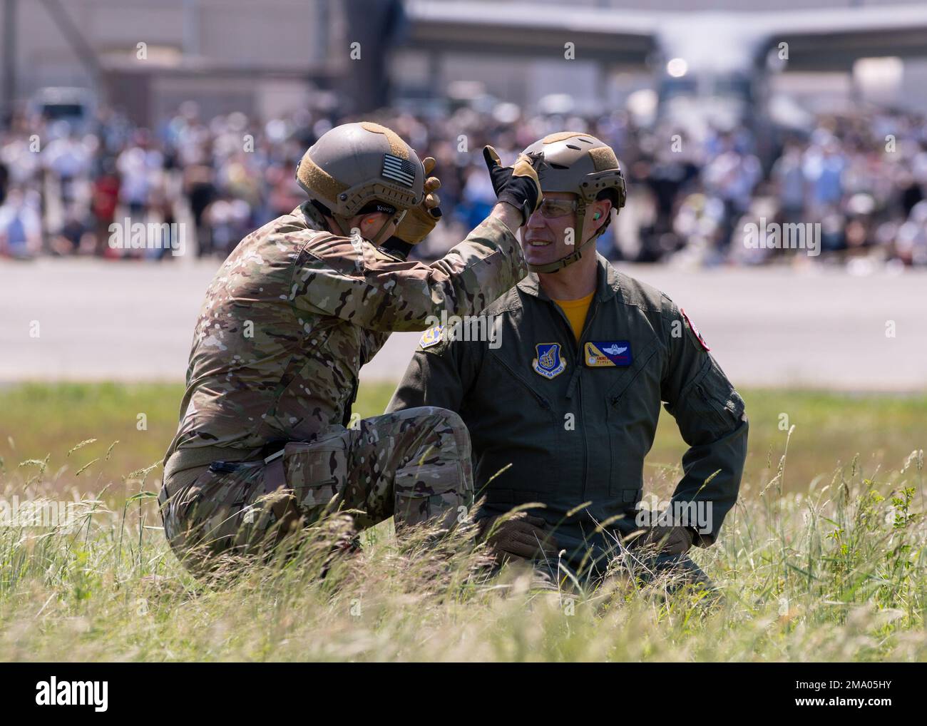 Col. Andrew Campbell, 374th Airlift Wing commander, is briefed on how ...