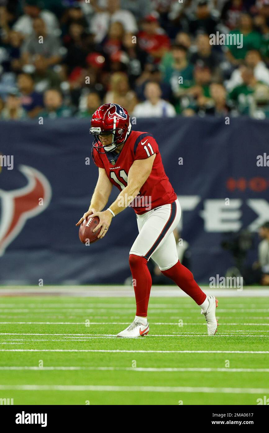 Houston Texans punter Cameron Johnston (11) looks to punt the ball ...