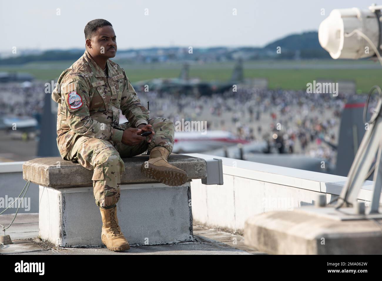 Chief Master Sgt. Jerry Dunn, 374th Airlift Wing command chief, watches ...