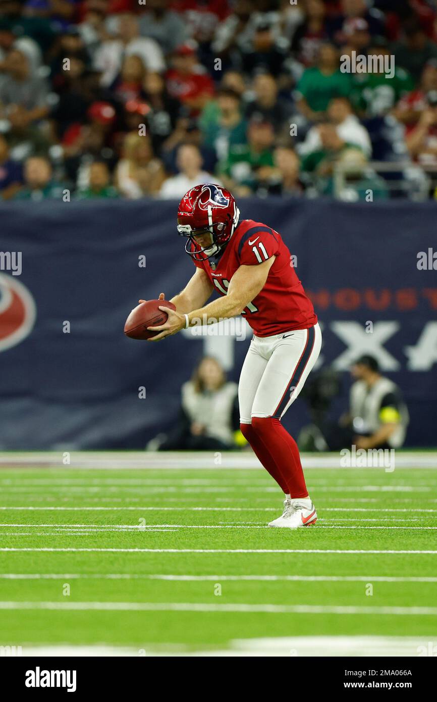 Houston Texans punter Cameron Johnston (11) looks to punt the ball ...