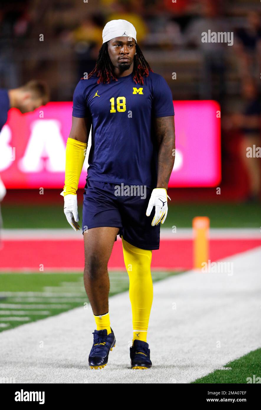 Michigan linebacker Eyabi Okie (18) during warm up before an NCAA ...