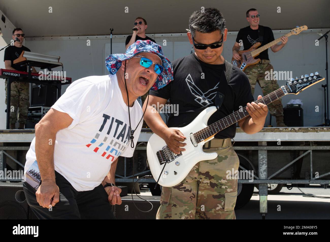 An airshow spectator joins Full Spectrum guitarist Tech. Sgt. Daniel ...