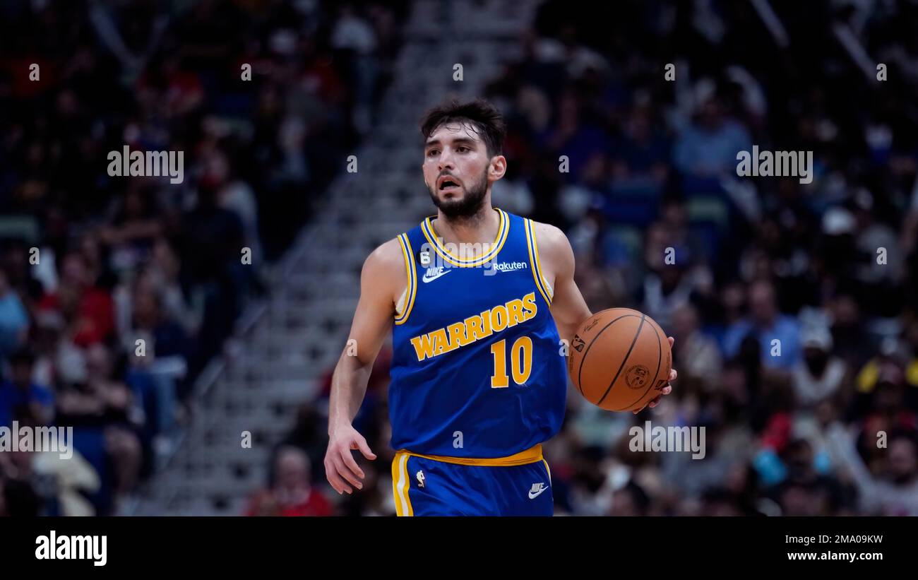 Golden State Warriors guard Ty Jerome (10) moves the ball up court in ...