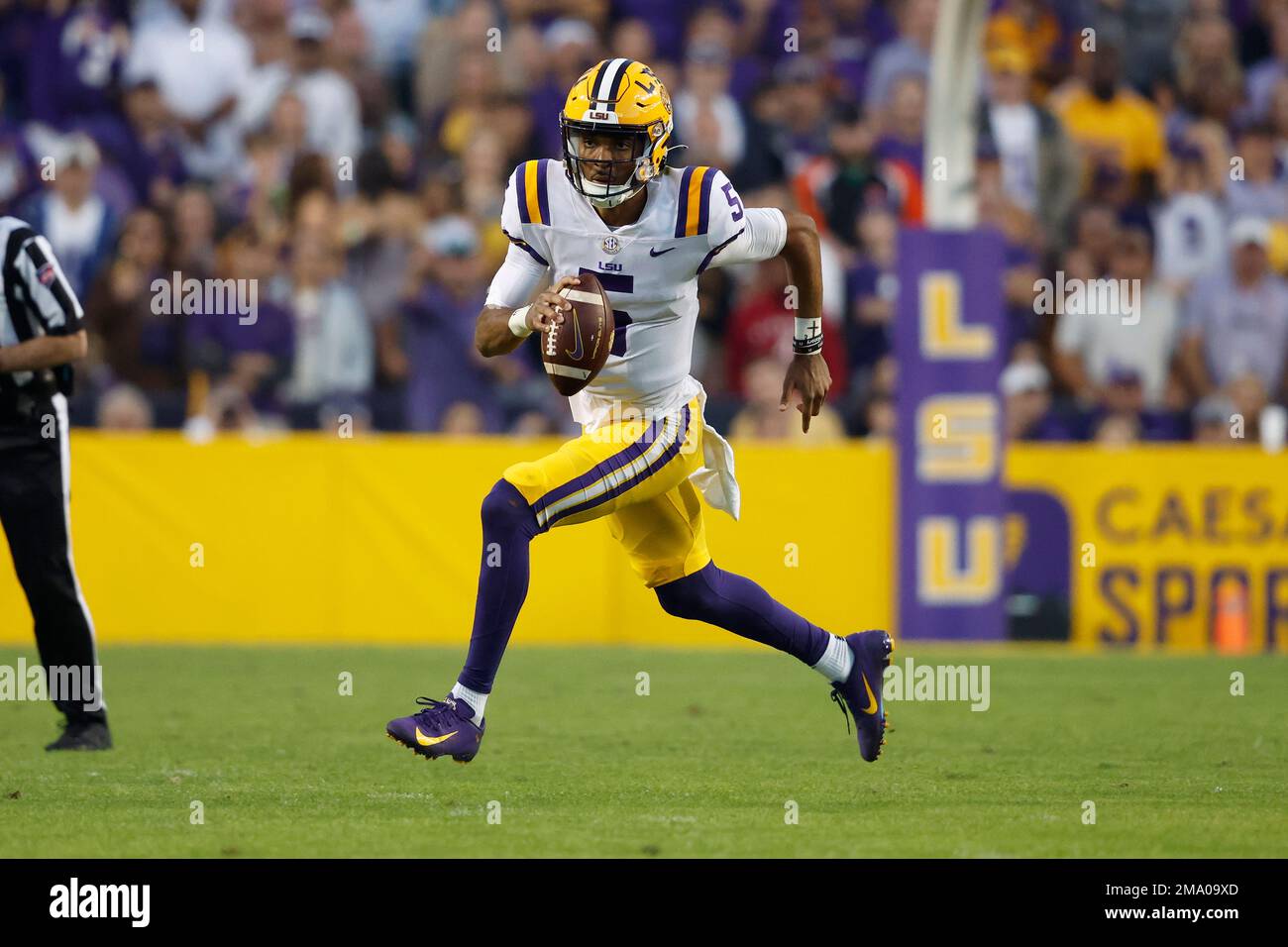 LSU quarterback Jayden Daniels (5) during the first half of an NCAA ...