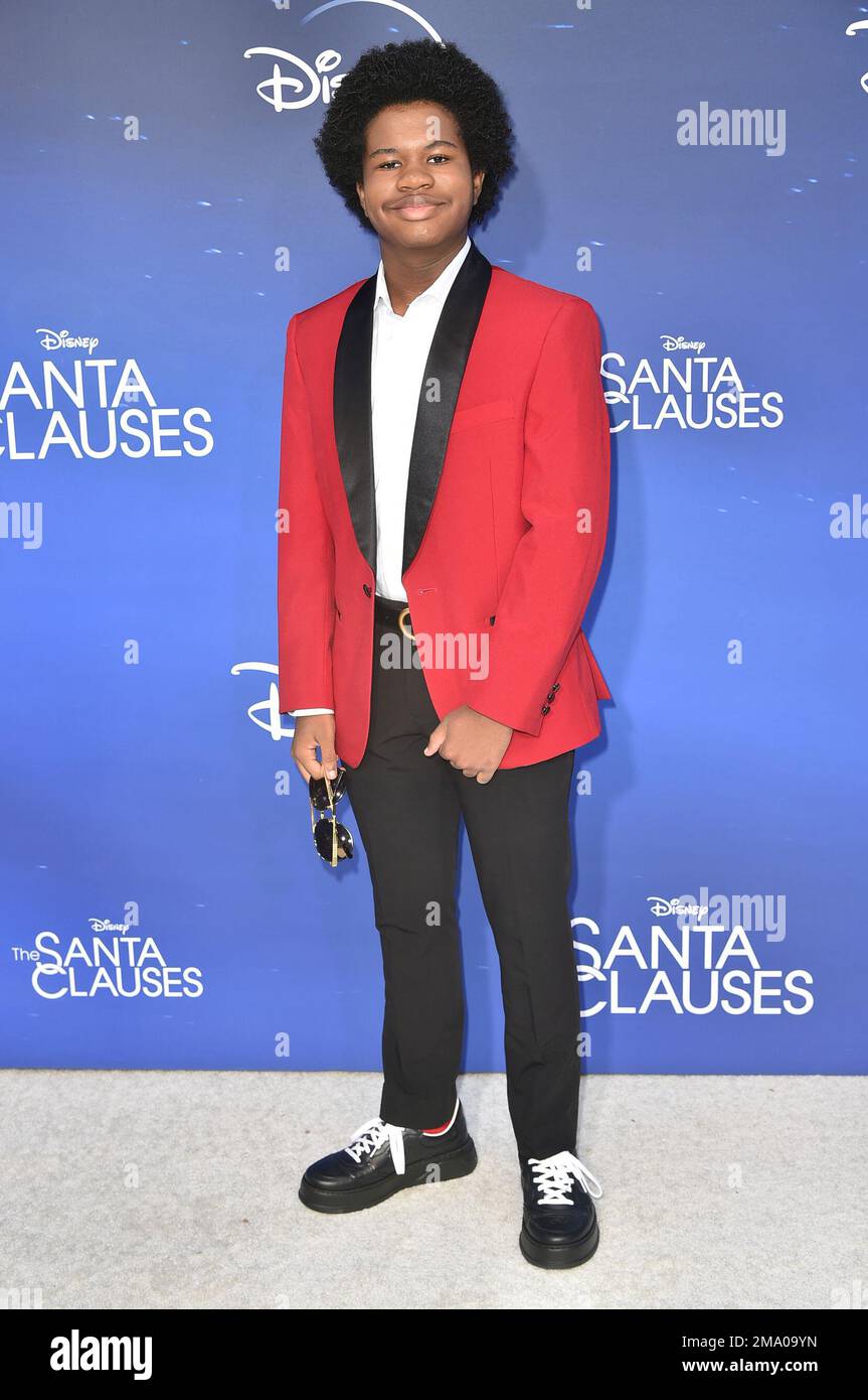 Devin Bright arrives at the premiere of "The Santa Clauses" on Sunday ...