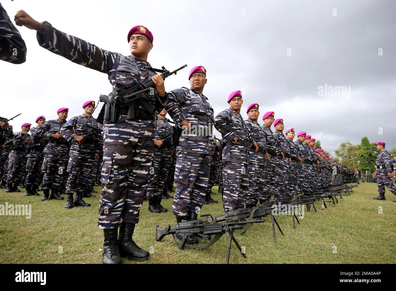 Military soldiers stand in attention during a security parade in ...