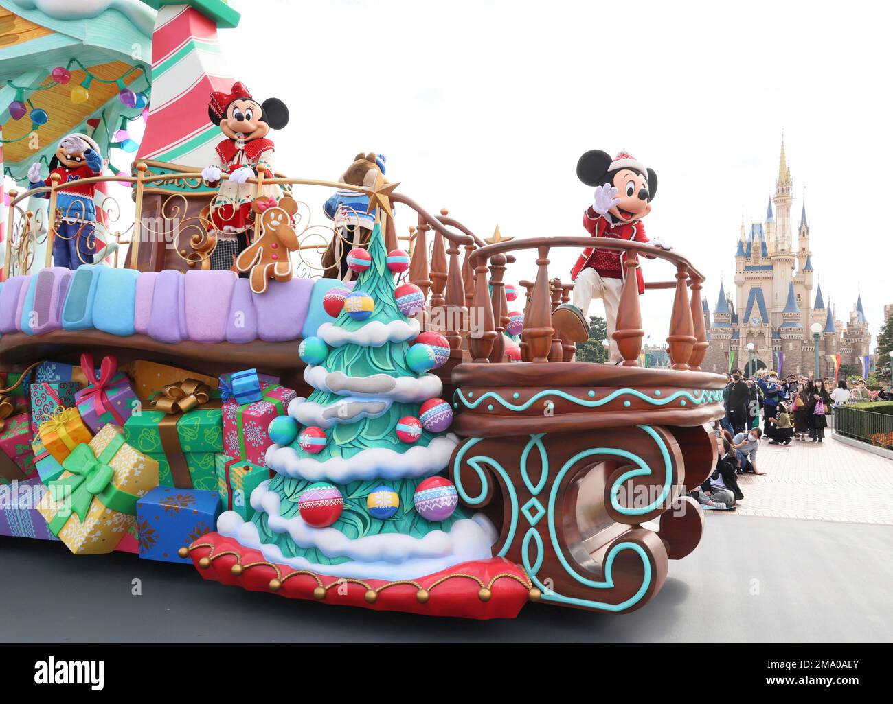 Disney characters Mickey and Minnie Mouse perform on a float for a ...