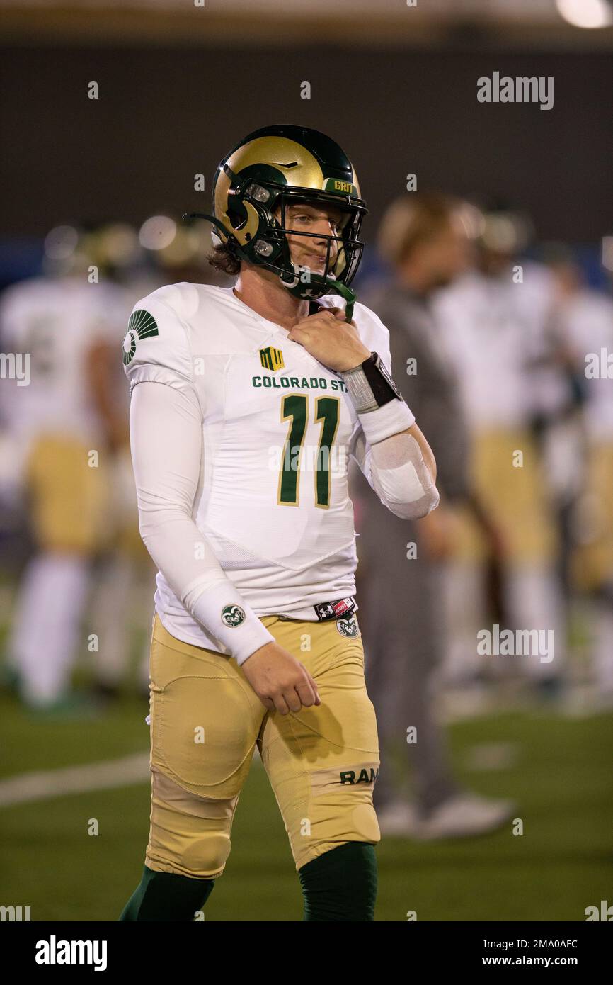 Colorado State quarterback Clay Millen (11) warms up with his teammates ...