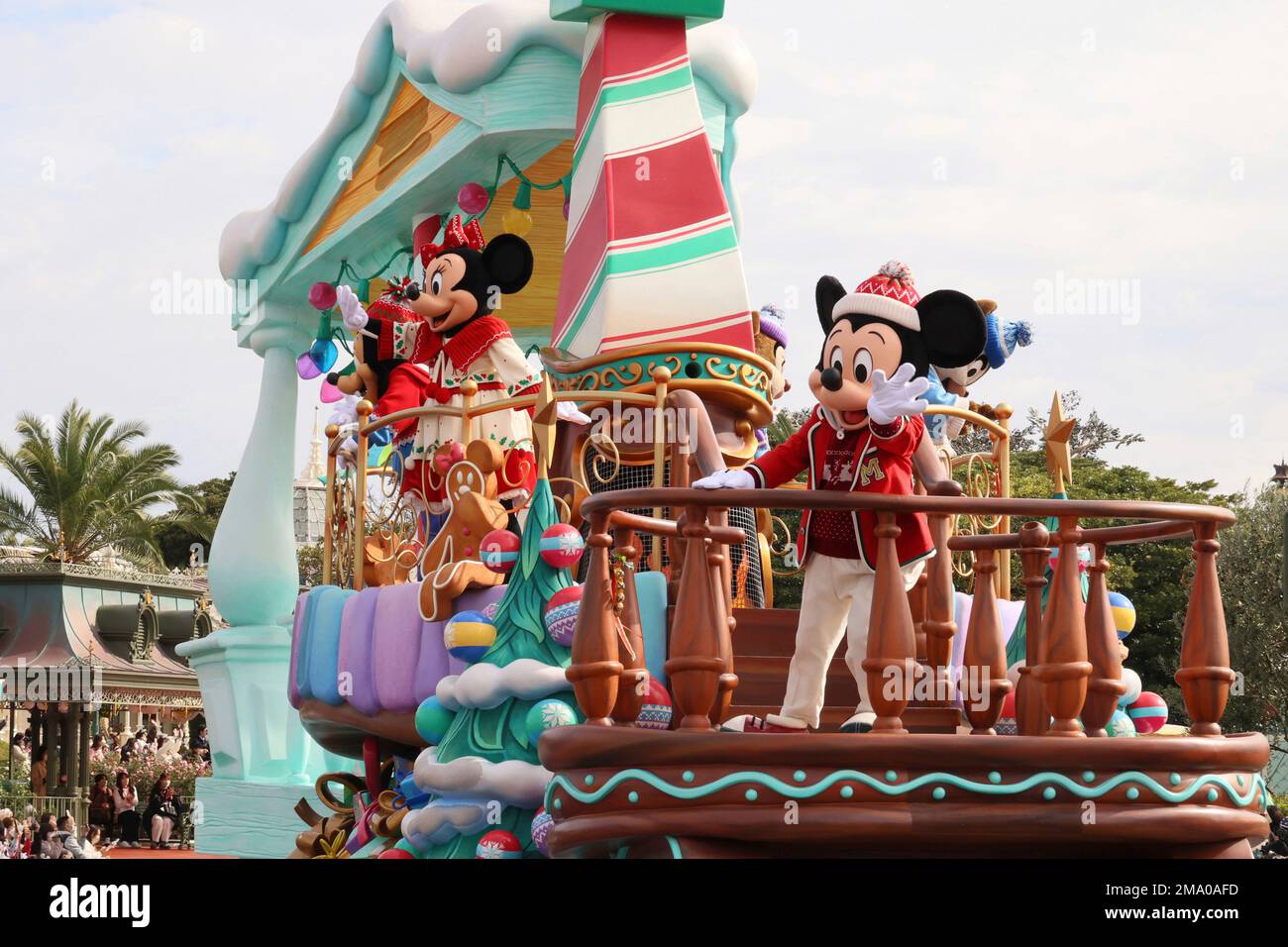 Disney characters Mickey and Minnie Mouse perform on a float for a ...