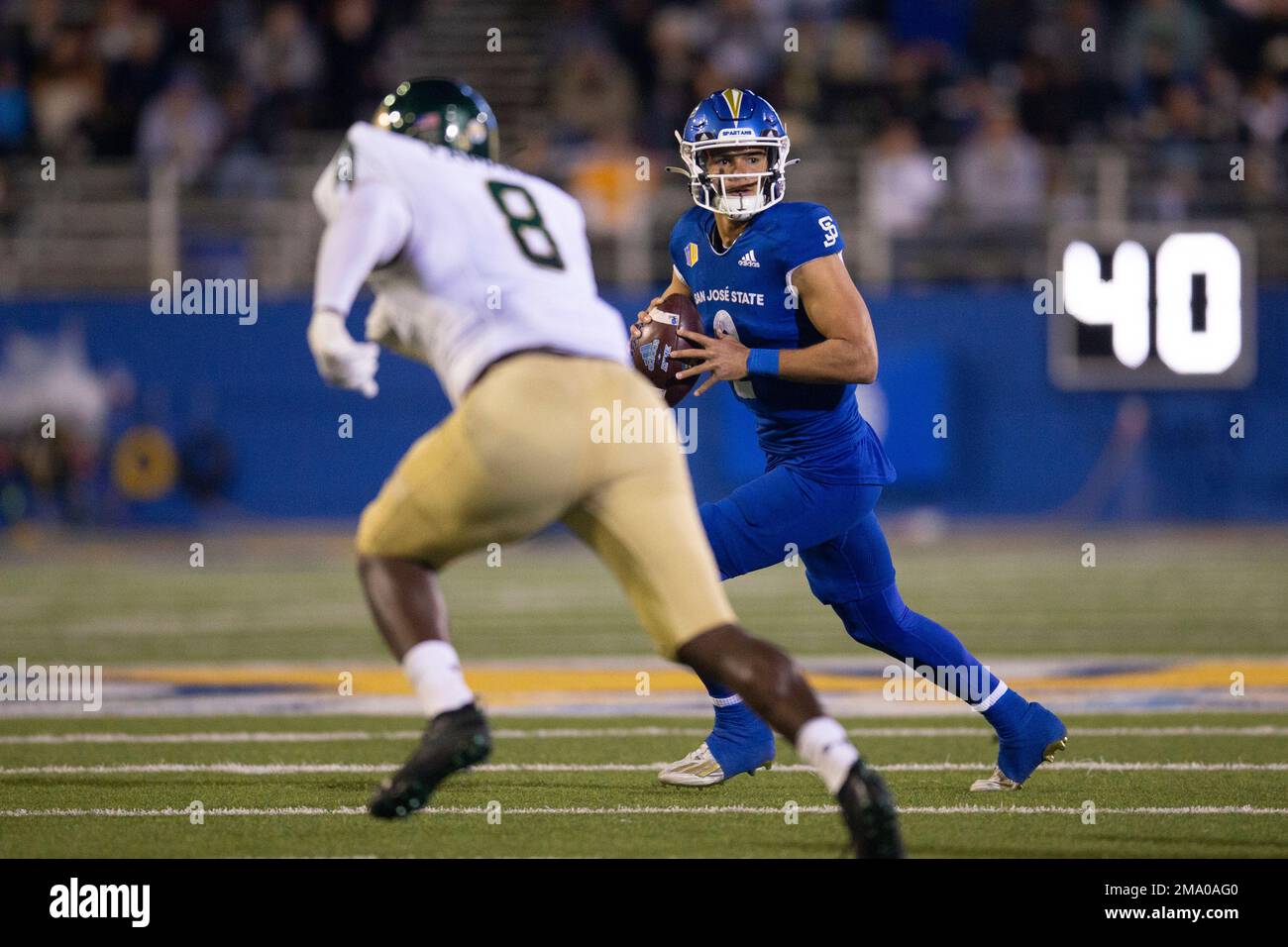 San Jose State quarterback Chevan Cordeiro (2) rolls out to pass with ...