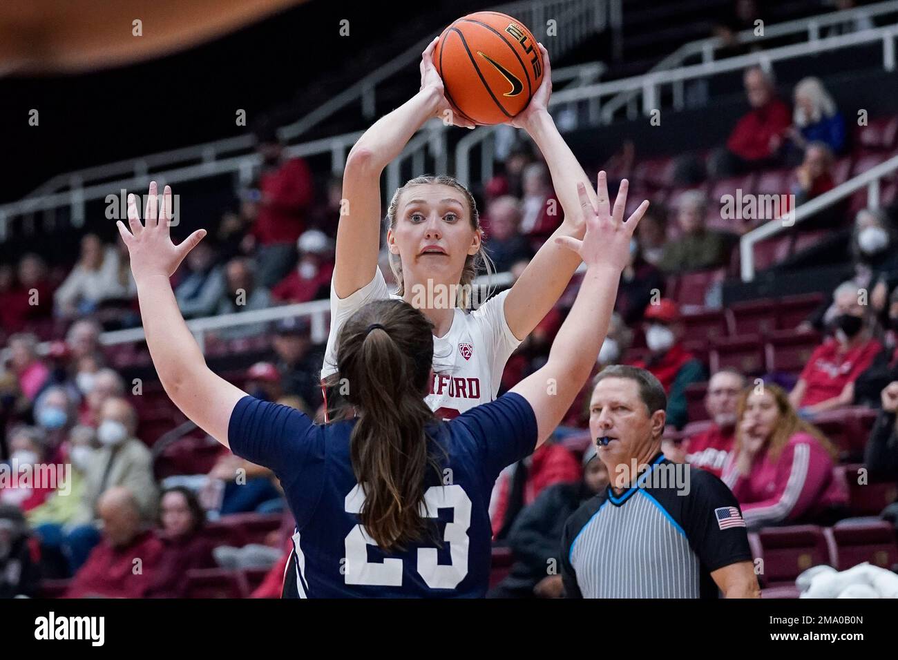 Stanford forward Cameron Brink, rear, looks to pass while being ...