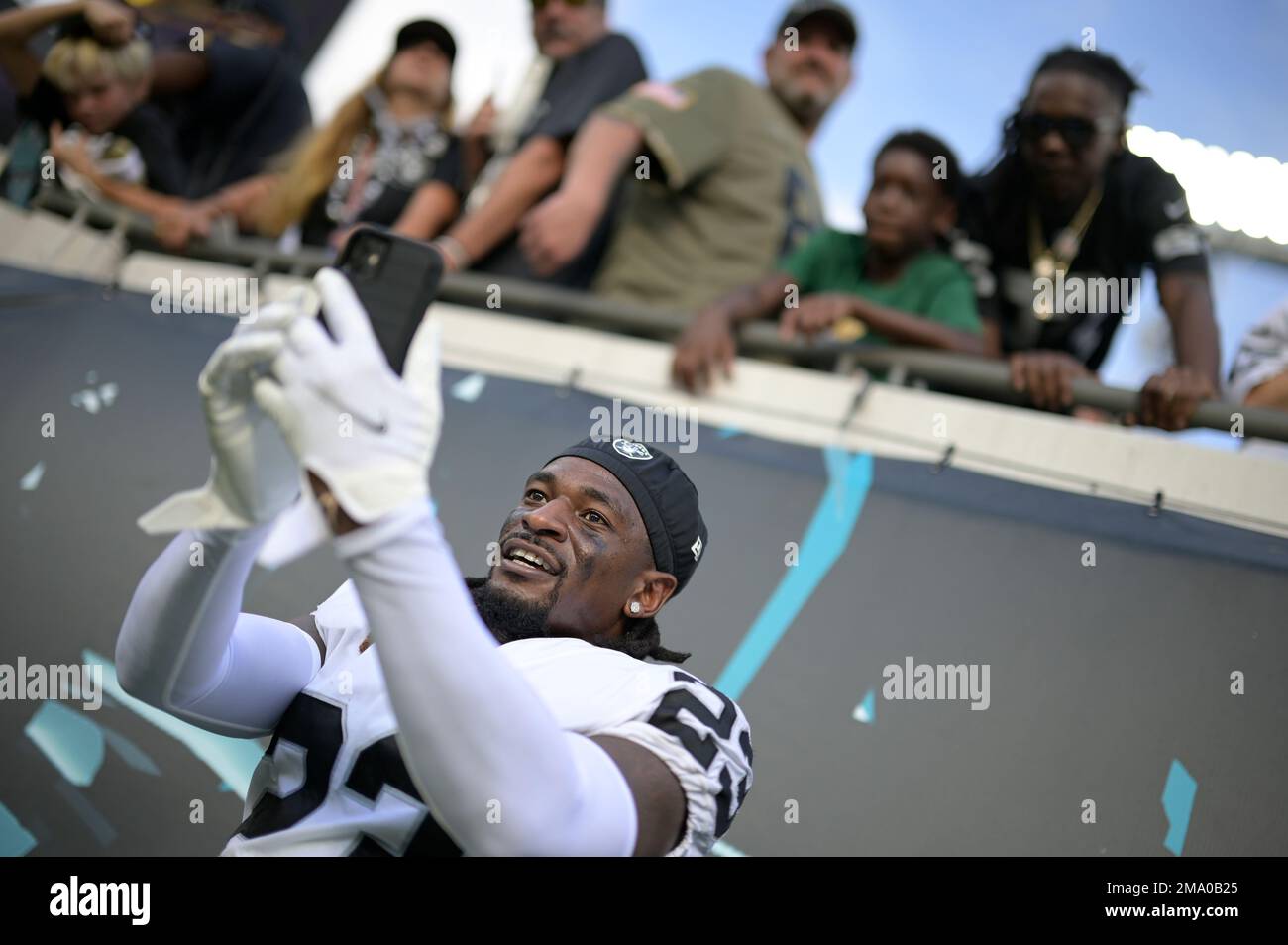Las Vegas Raiders cornerback Nickell Robey-Coleman (23) makes a selfie ...