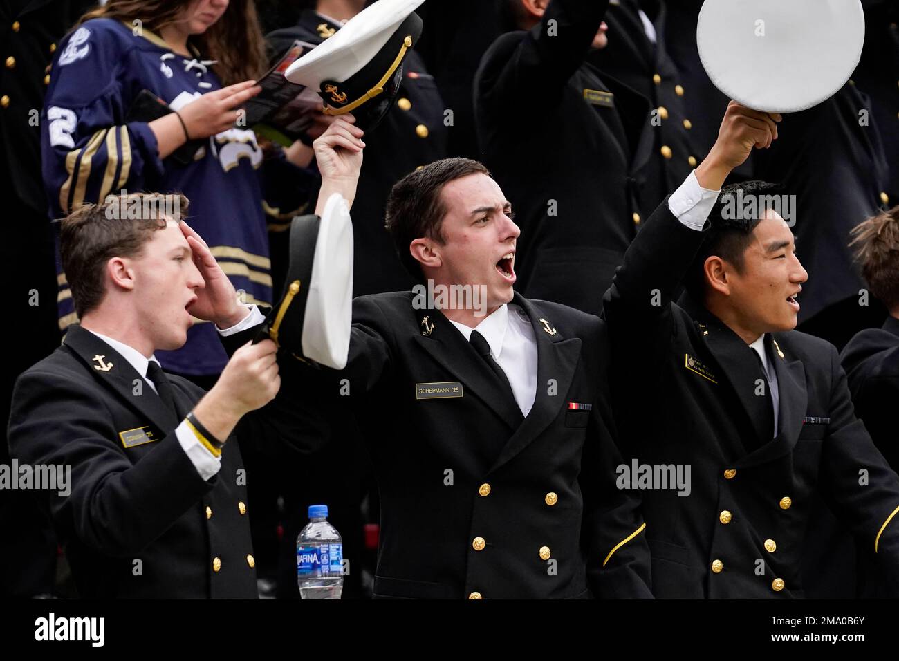 Navy midshipmen attend an NCAA college football game against Cincinnati ...